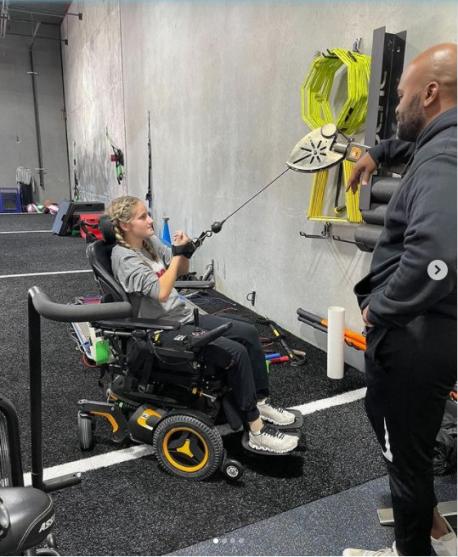 Paralyzed cheerleader hopes to defy odds and inspire others by walking ...